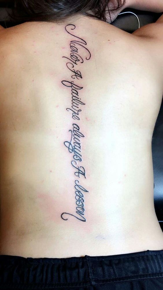 17 Cursive Spine Tattoo Ideas: Timeless Elegance and Grace