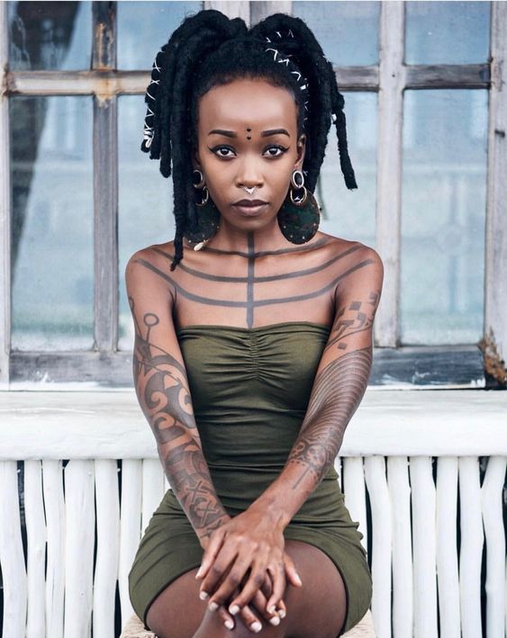 25 Colorful Tattoo Ideas for Dark Skin Tones: Celebrating Vibrancy and ...