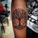 Celebrate Life: 20 Long Live Tattoo Ideas for Dark Skin