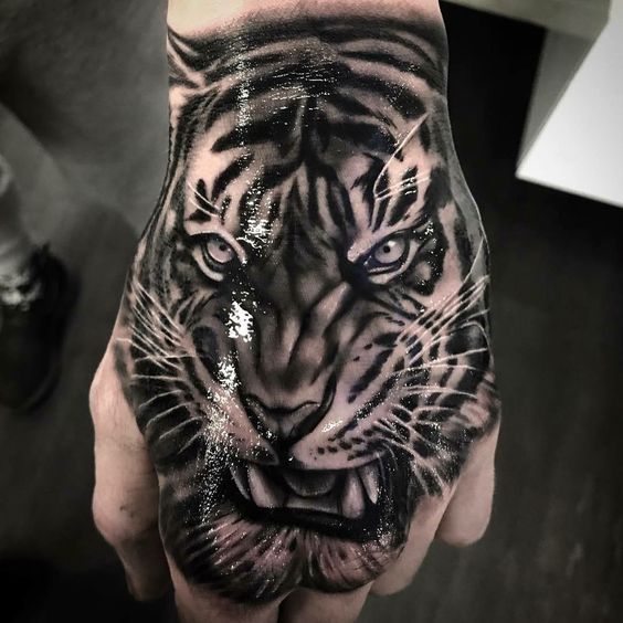 25 Tiger Tattoo on Hand Ideas - Welcome to Fashion Maverick! Discover ...