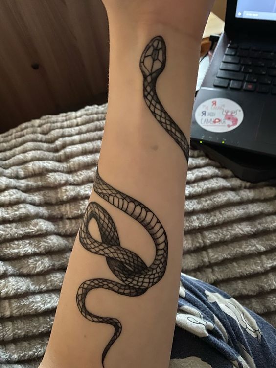 20 Celebrating with Symbolic Snake Tattoos - Welcome to Fashion ...