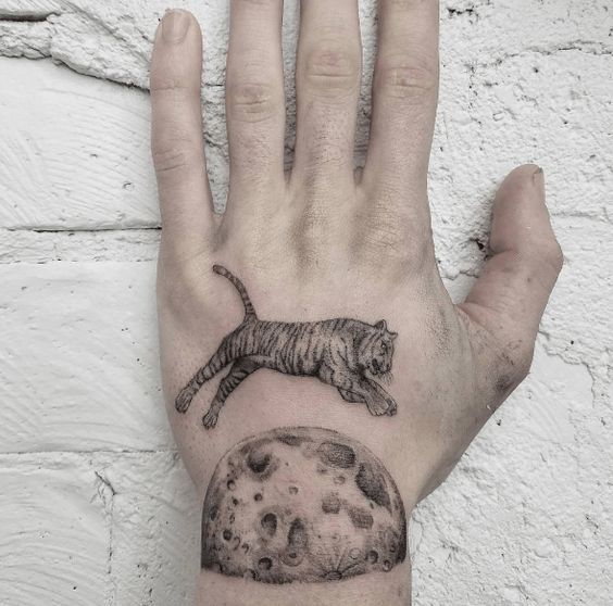 25 Tiger Tattoo on Hand Ideas - Welcome to Fashion Maverick! Discover ...