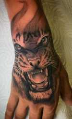 25 Tiger Tattoo on Hand Ideas - Welcome to Fashion Maverick! Discover ...