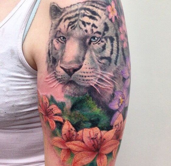 29 Fierce and Feminine: Women's Tiger Tattoo Ideas for Empowerment