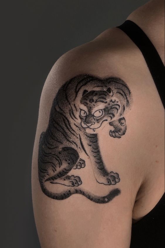 29 Fierce and Feminine: Women's Tiger Tattoo Ideas for Empowerment