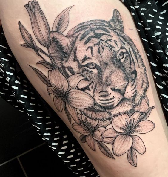 29 Fierce and Feminine: Women's Tiger Tattoo Ideas for Empowerment