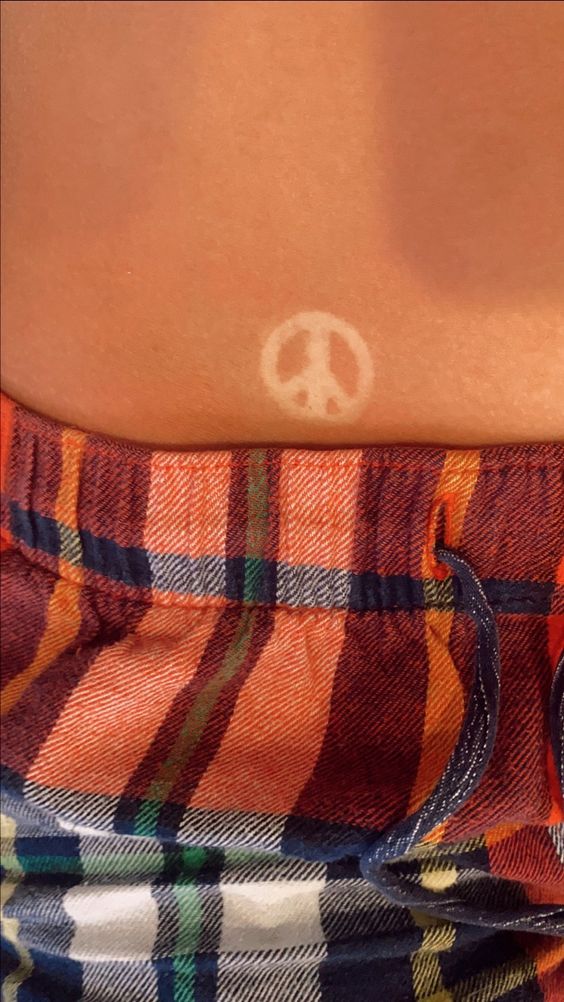 15 Creative Tan Tattoo Ideas for 2024: Embrace the Sun with Stylish ...