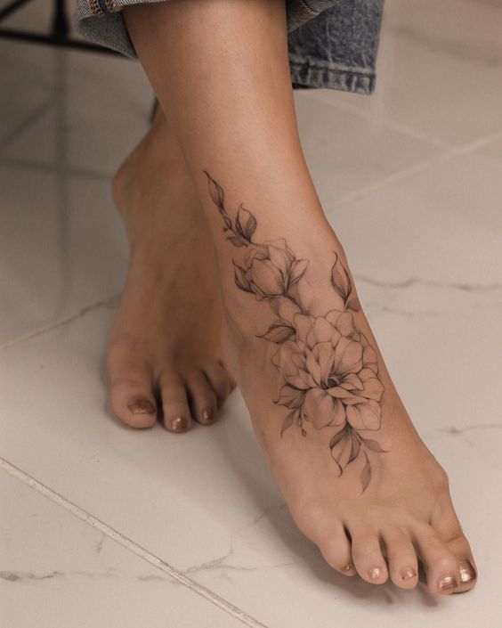 Discover 15 Trendsetting Flower Foot Tattoo Designs for Women in 2024